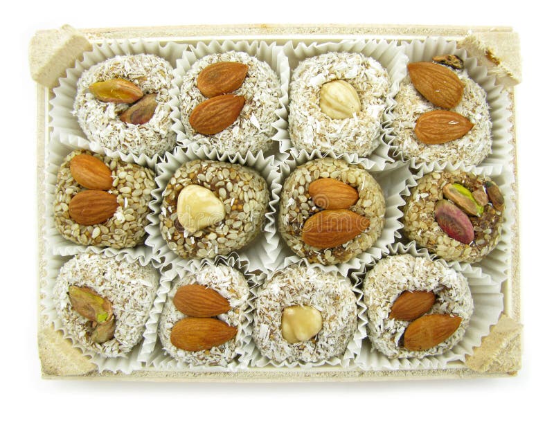 Nut topped cookies in box stock image. Image of almond - 10644099