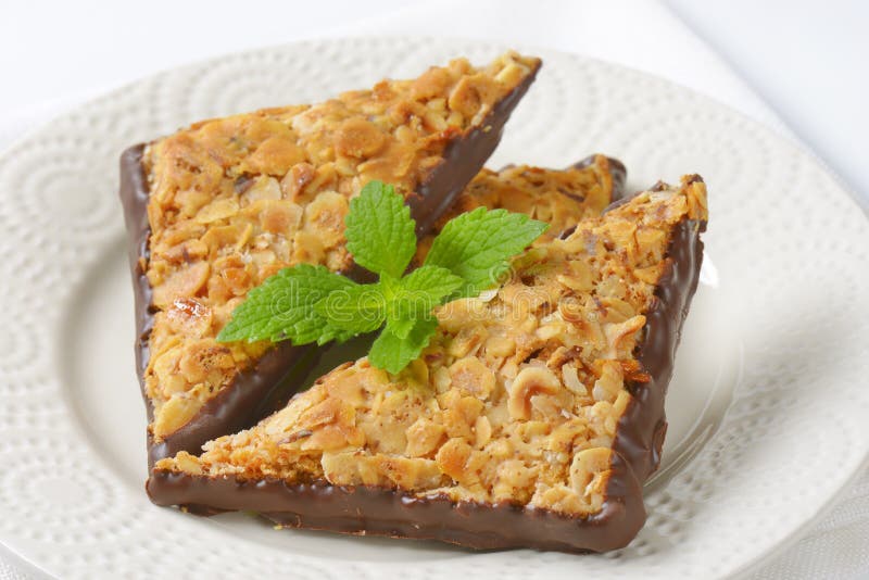 Nut triangular cookies stock photo. Image of sweet, chocolate - 70513752