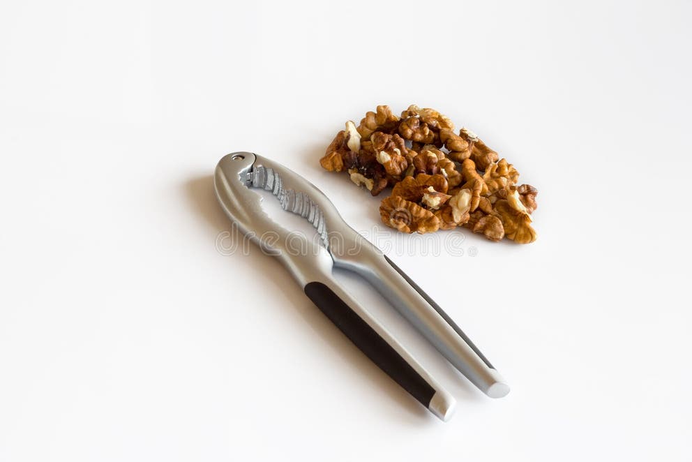 Nutcracker and Broken Walnuts Stock Image - Image of force, kitchen ...