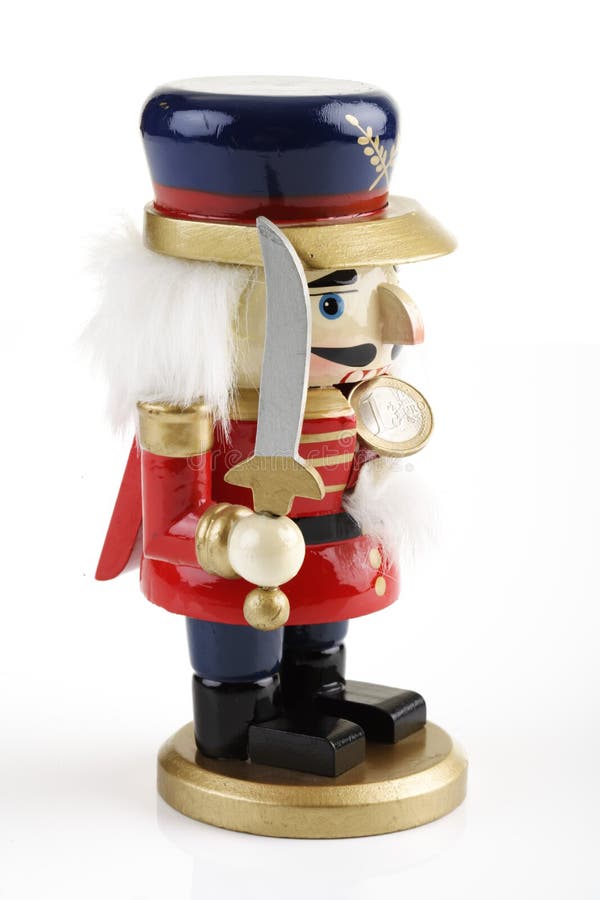 Nutcracker with Sword and Euro Coin Stock Image - Image of figurine ...