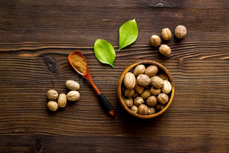 Nutmeg - Ground Indian Condiment in Spoon - on Wooden Background Top ...