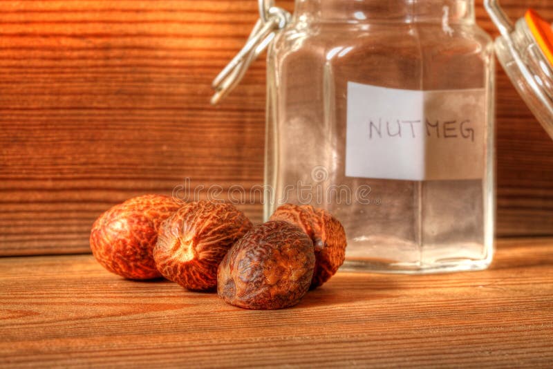 Nutmeg with jar stock image. Image of ingredient, india - 24441153