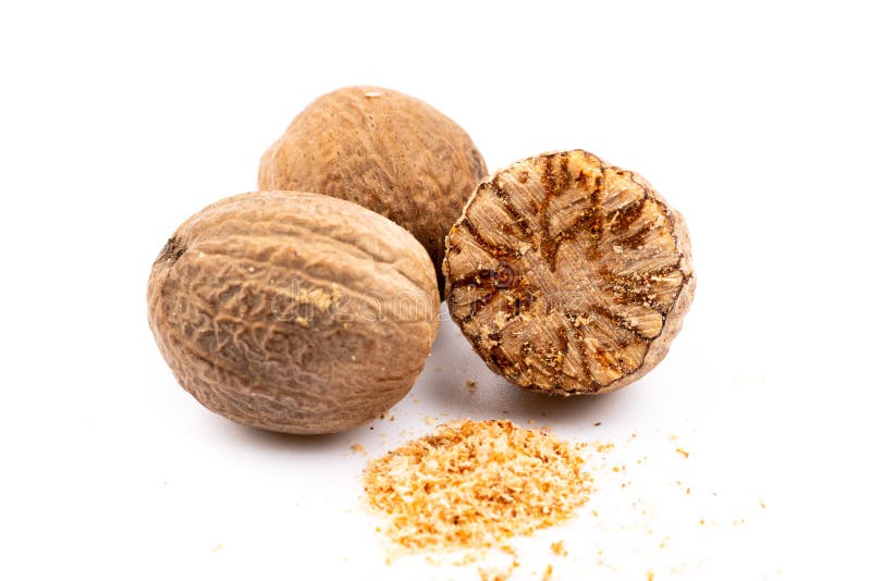 Nutmeg on white background stock photo. Image of snack - 143736678