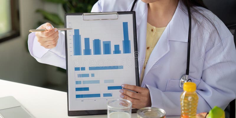 Nutrition Analysis. a Dietitian Explaining Data on Food Consumption ...