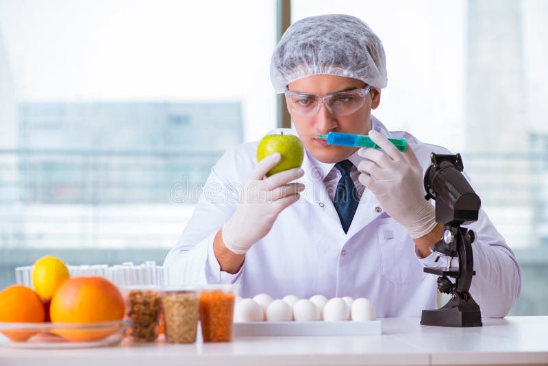 The nutrition expert testing food products in lab. Natural, genetically ...