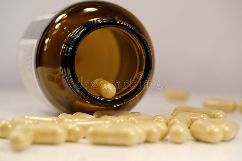 Nutritional Supplements Container and Capsules Stock Image - Image of ...