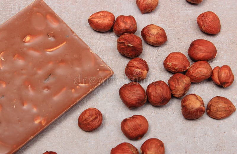 Nutritious Chocolate and Hazelnuts on Cement Structure Stock Image ...