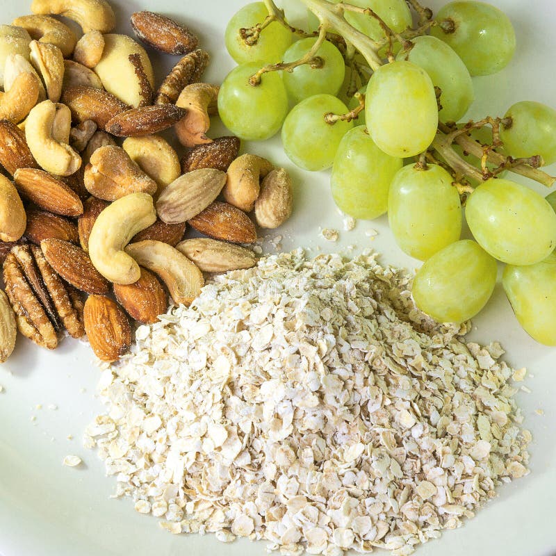 Nutritious Food Groups of Grapes, Mixed Nuts and Oats in Next To Stock ...