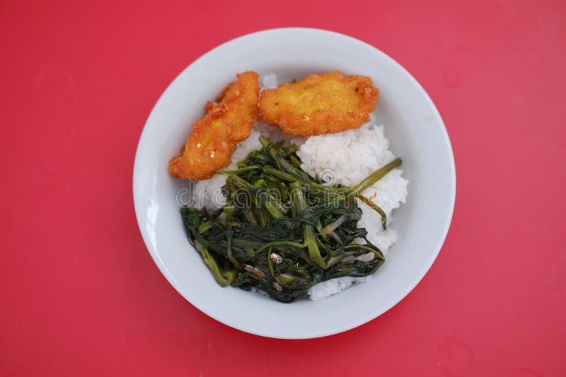 Nutritious Plate of Food Featuring Rice and Assorted Vegetables, a ...
