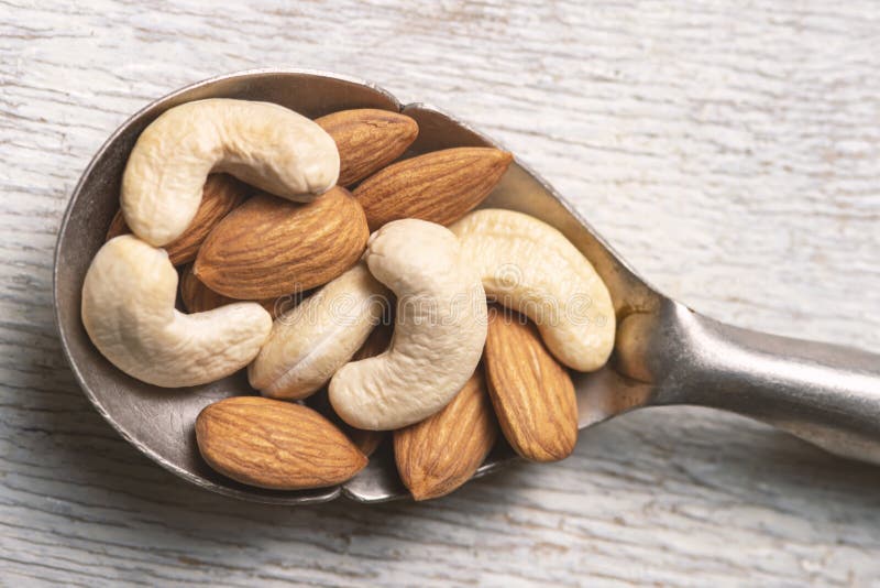 Nuts in Big Vintage Silver Spoon. Stock Photo - Image of fresh, brown ...