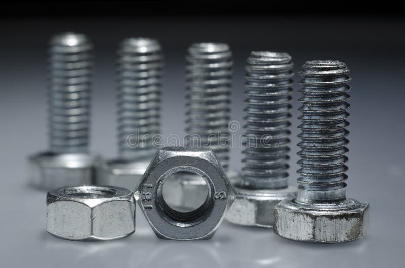 Nuts and bolts 11 stock image. Image of chromium, industry - 71661599