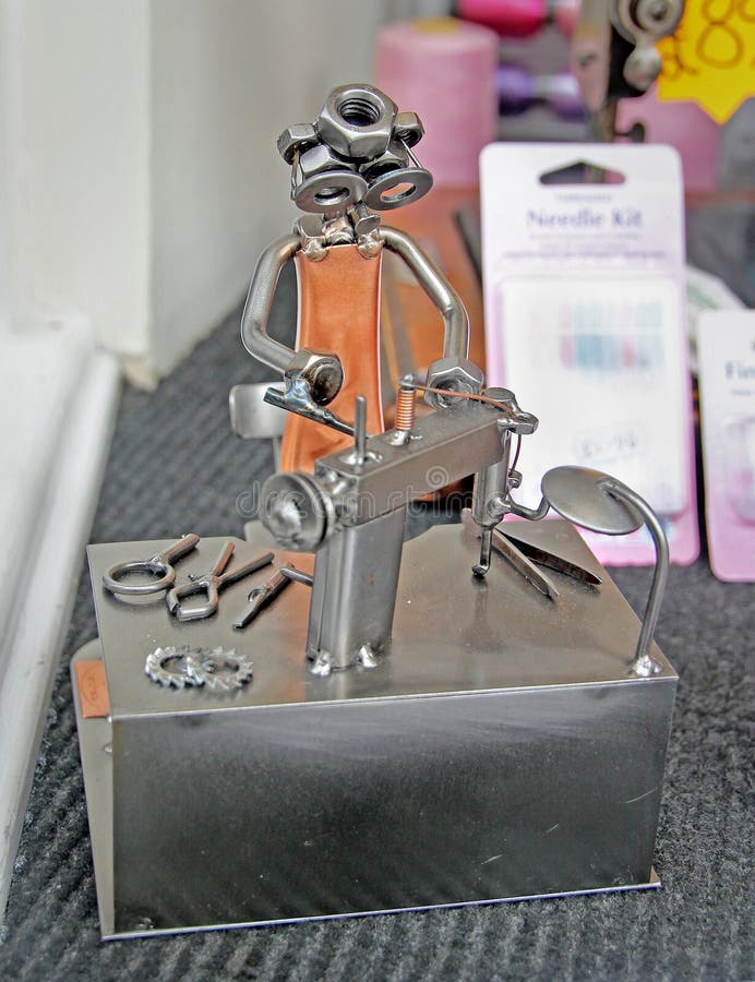 Nuts and Bolts Sewing Figurine Stock Photo - Image of handmade, weld ...