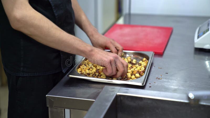 Nuts Clean Hands from Husk in a Restaurant Kitchen Stock Footage ...