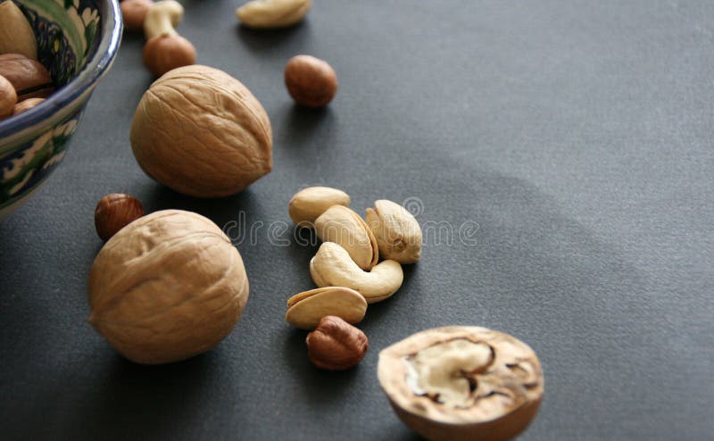 Nuts on Dark Background, Top View with Copyspace. Stock Image - Image ...