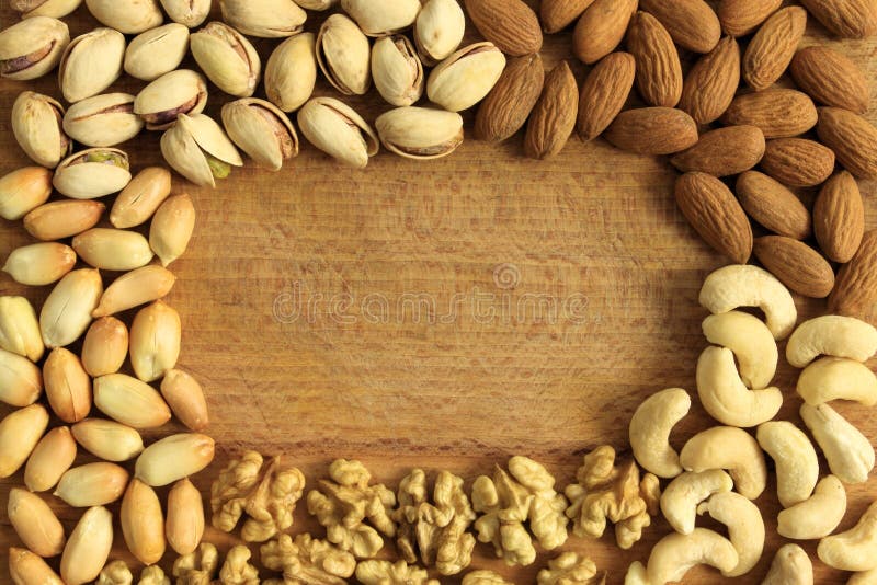 Border of Mixed Nuts stock photo. Image of almond, edible - 24692256