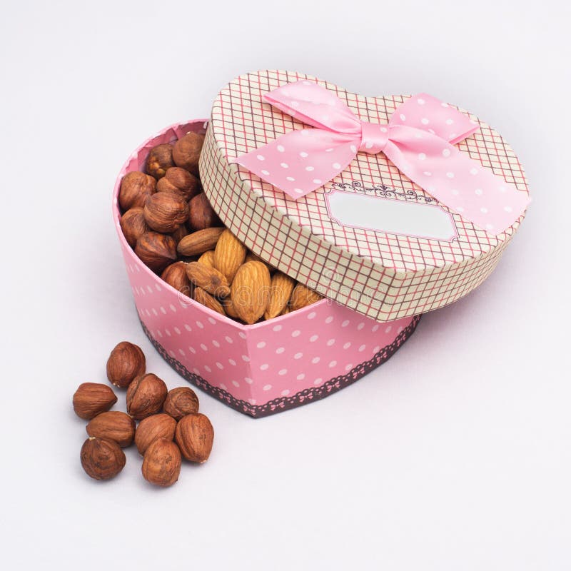 Nuts in a gift box stock image. Image of goodies, seed - 75056699