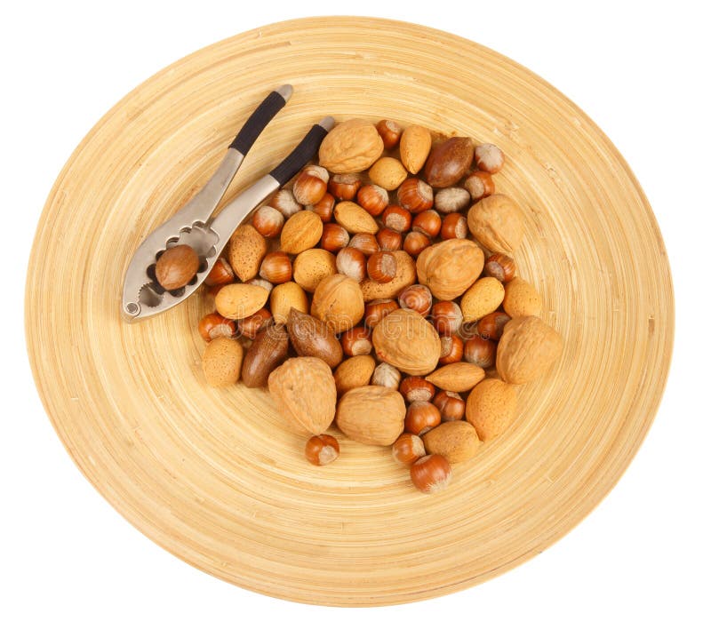 Nuts and nutcracker stock photo. Image of food, bowl - 22592156