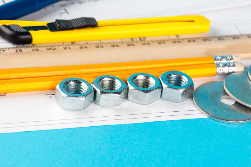 Nuts and Parts of the Construction are Laid Out in a Dented Drawing ...