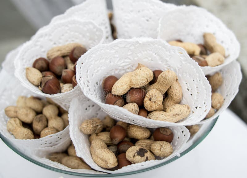 Nuts and Peanuts in Paper Packets Stock Photo - Image of paper ...