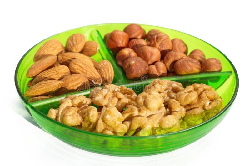 Nuts on a Plate on a White Background Stock Image - Image of ingredient ...