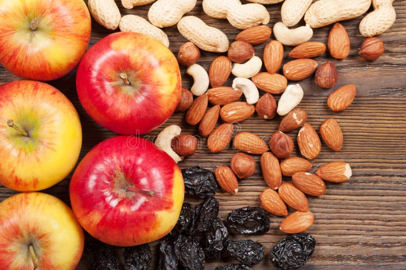 Nuts and red apples stock photo. Image of sweet, concept - 87791682