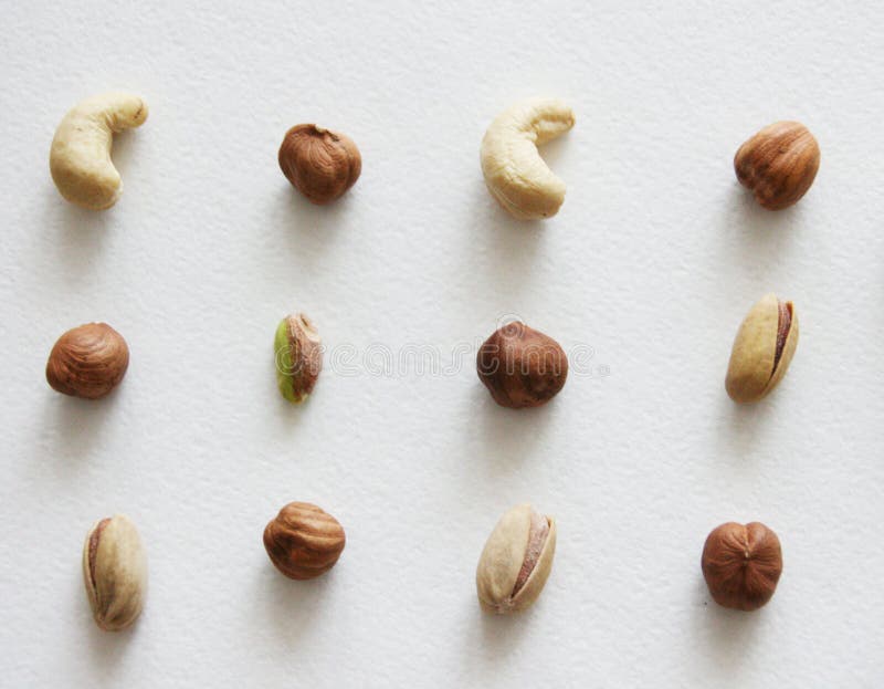 Nuts on White Background As Pattern, Top View. Stock Photo - Image of ...