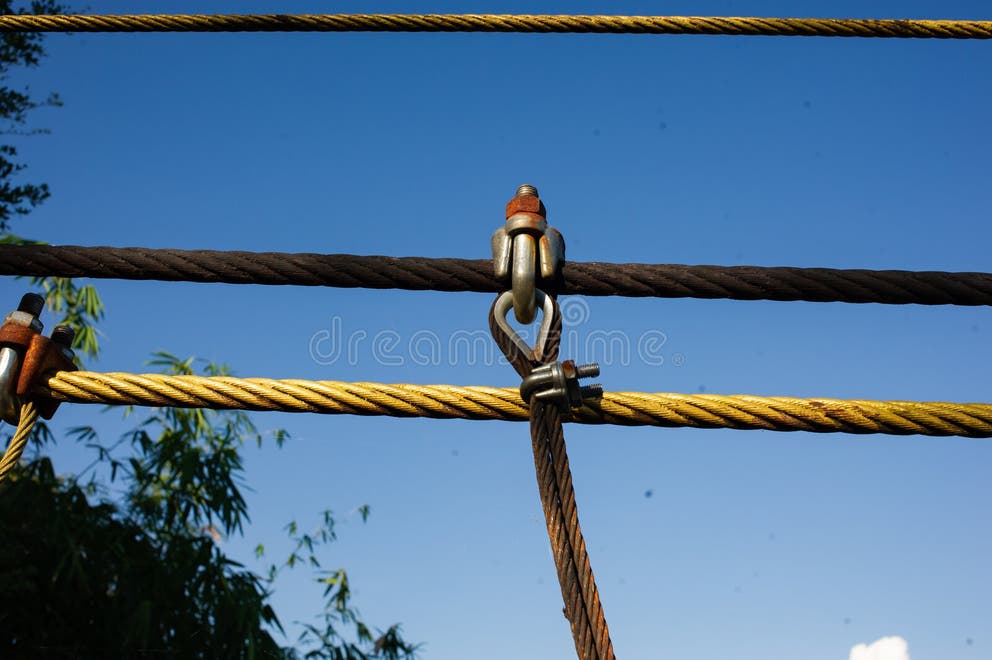 Nuts and wire ropes stock photo. Image of connection - 263558416