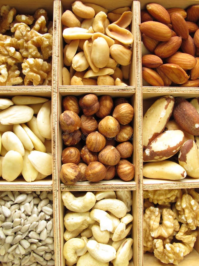 Nuts in wooden box stock photo. Image of seeds, ingredients - 26698324