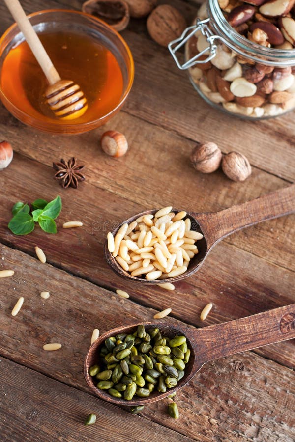 Nuts on wooden table stock photo. Image of focus, nature - 75419886
