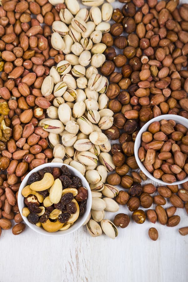 Nuts on a wooden table. stock image. Image of gourmet - 94448369