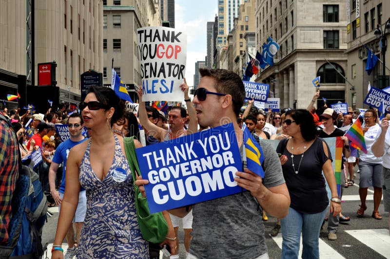 NYC: Marchers Carrying Rainbow Flags at Gay Pride Parade Editorial ...