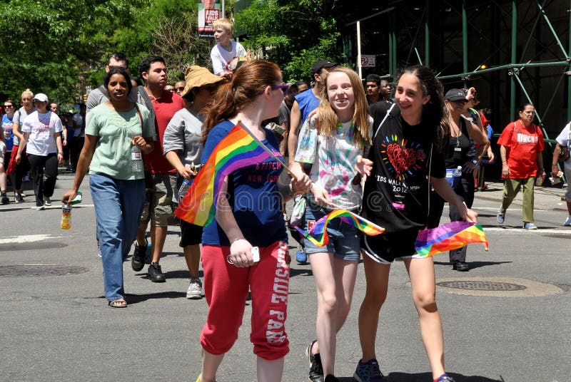 NYC: Marchers Carrying Rainbow Flags at Gay Pride Parade Editorial ...