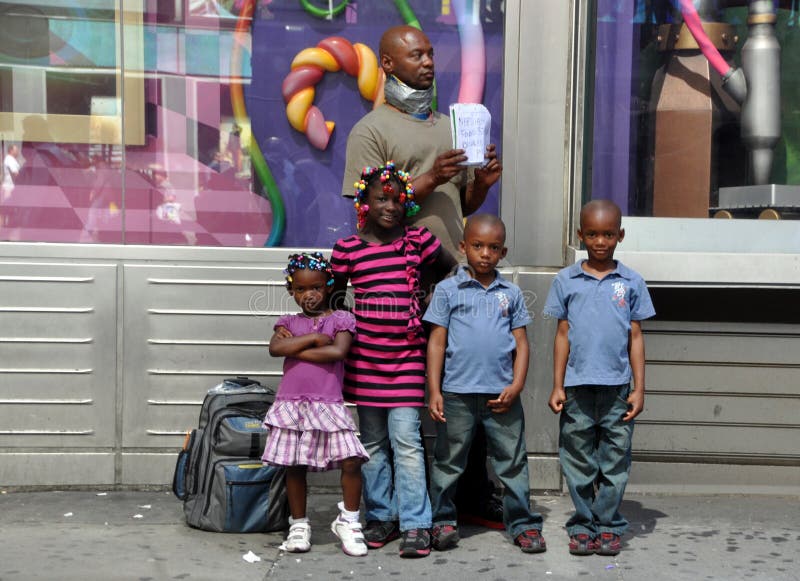 NYC: Family Seeking Donations in Times Square Editorial Photo - Image ...