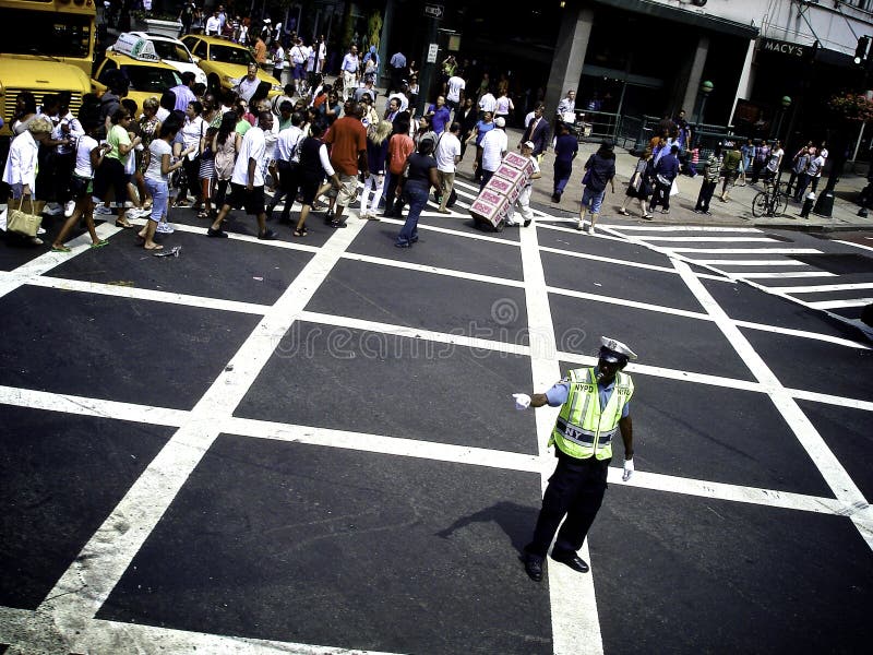 NYPD Traffic Officer at the Intersection of 5th Avenue and 42nd Street ...
