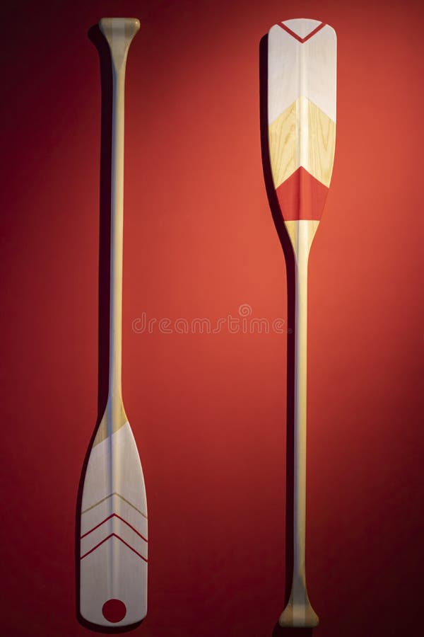 Oars on a red background stock image. Image of athletics - 207447387
