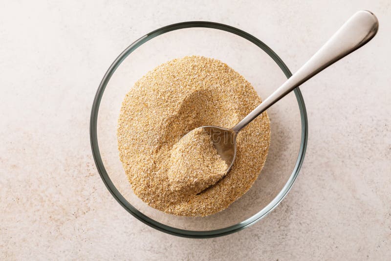 Oat Bran in a Transparent Plate with a Spoon on the Table Stock Photo ...