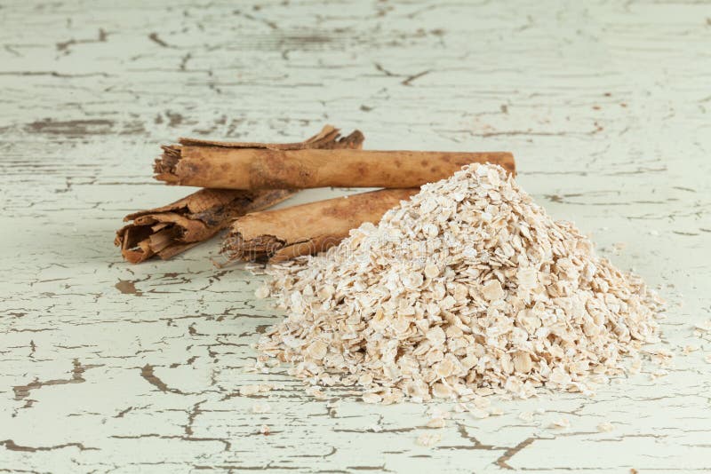 Oat Flakes with Cinnamon Sticks Stock Photo - Image of cooking, flavor ...