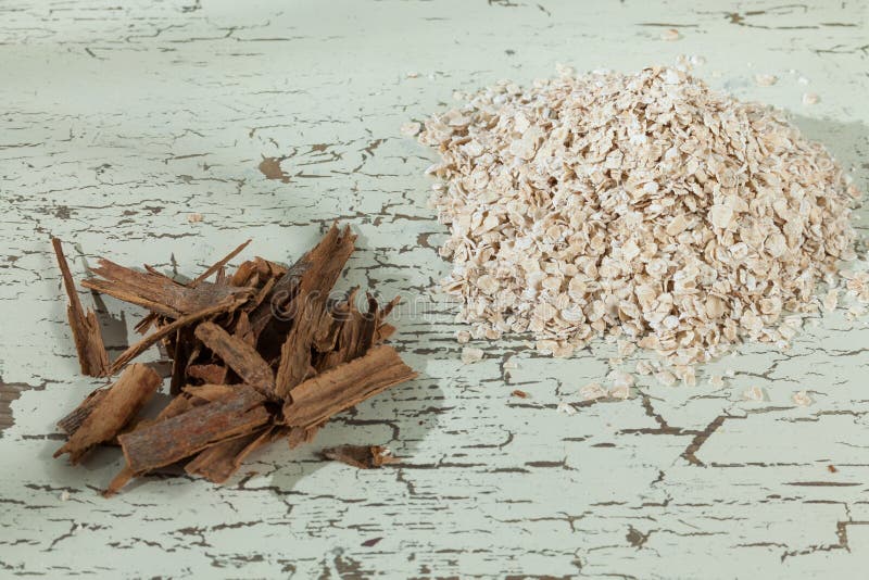Oat Flakes with Cinnamon Sticks Stock Photo - Image of cinnamon, aroma ...