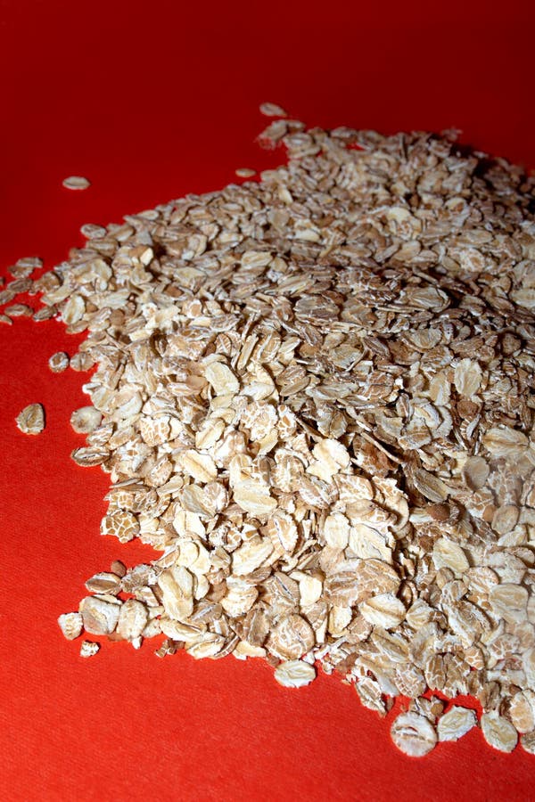 Oat Flakes on a Red Background. Healthy Cereals Stock Photo - Image of ...
