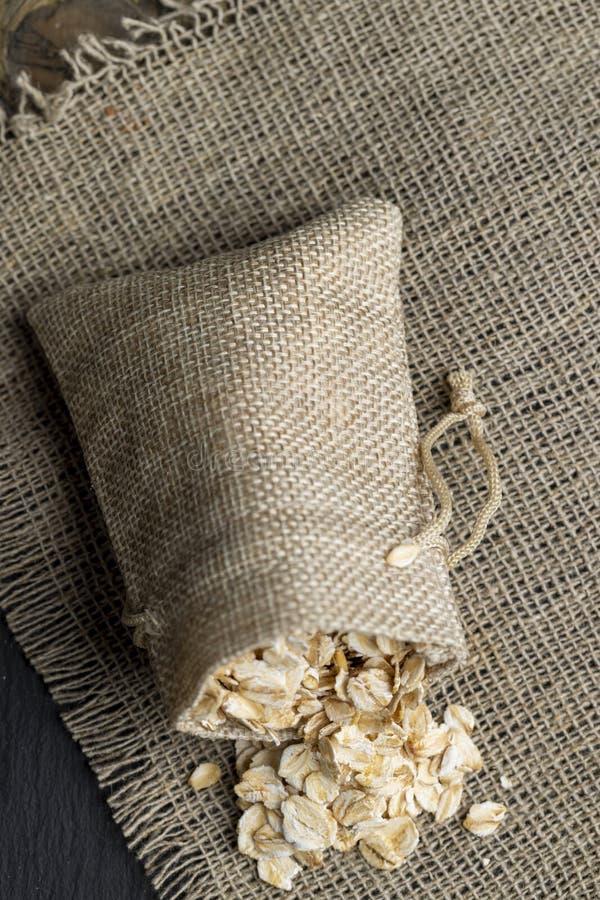 Oat Flakes Scattered on Coarse Linen Fabric Stock Photo - Image of ...