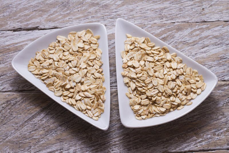 Oat flakes on table stock photo. Image of oatmeal, seed - 108648052