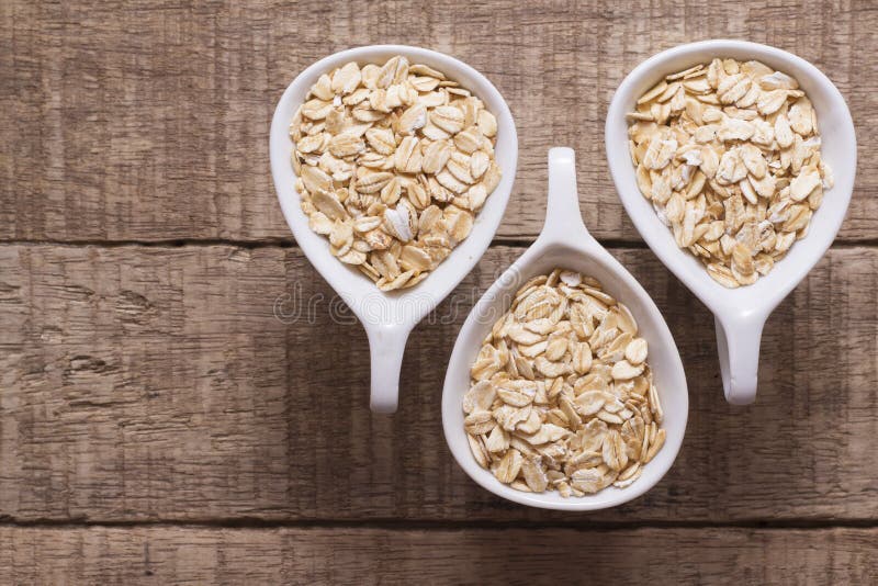 Oat flakes on table stock photo. Image of food, porridge - 108648584
