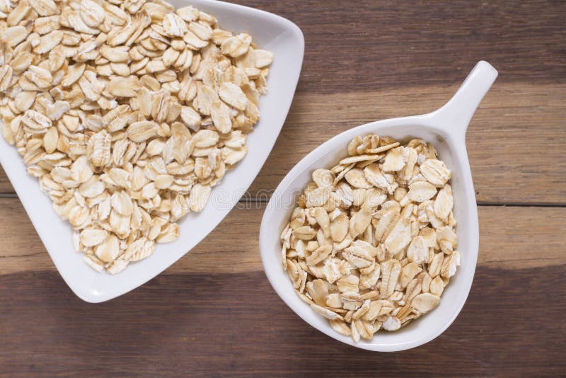 Oat flakes on table stock image. Image of oatmeal, heap - 108648765