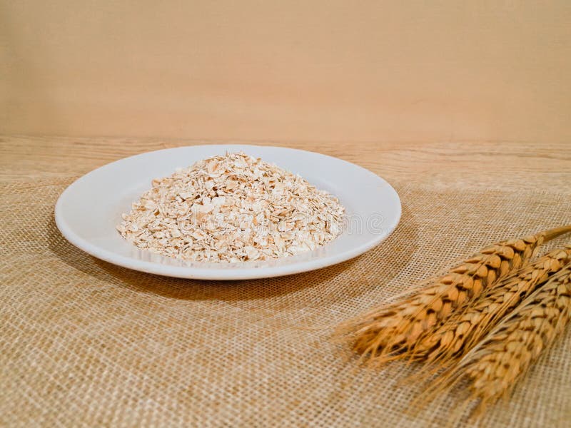 Oat, Oat Grains, Oat Flakes in a White Plate with Whole Wheat, Wood ...