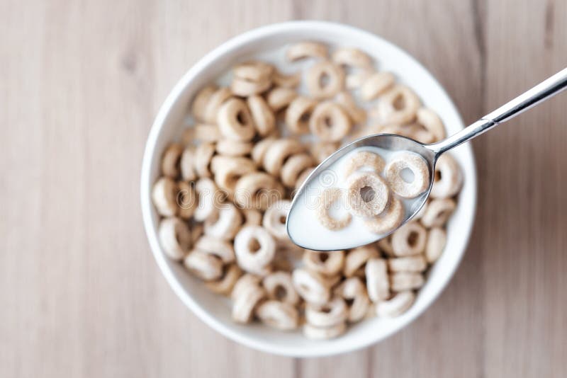 Oat rings with milk stock photo. Image of honey, white - 132936414