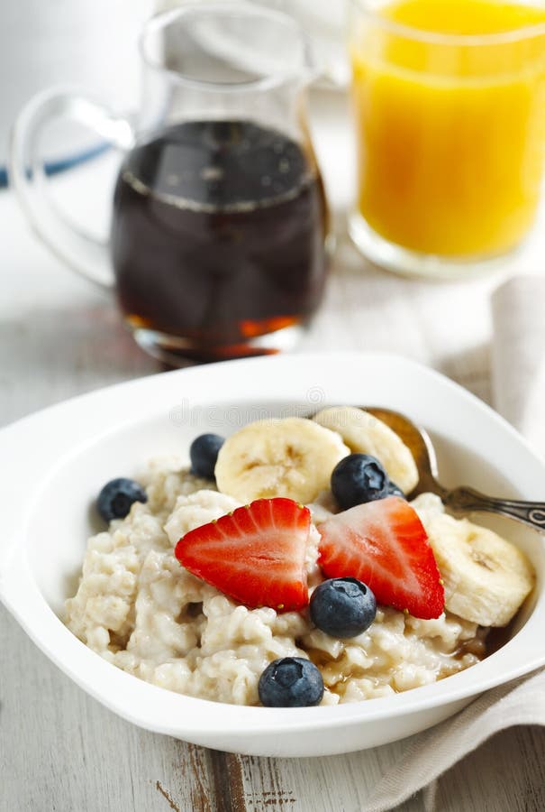 Oatmeal with Berries and Maple Syrup Stock Image - Image of oatmeal ...