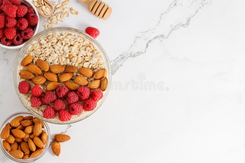 Oatmeal with Berries and Nuts. Healthy Breakfast Concept Stock Photo ...