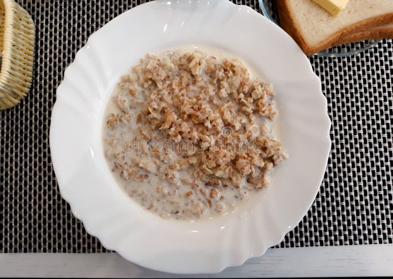 Oatmeal for breakfast stock image. Image of portion - 139893113