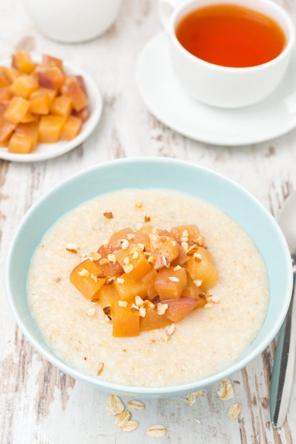 Oatmeal with Caramelized Peaches and Tea for Breakfast, Top View Stock ...