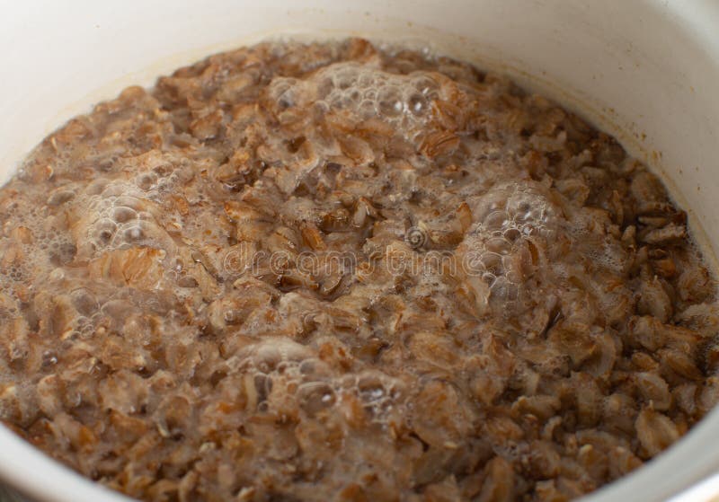 Oatmeal,cooking, Cereal in Boiling Water Stock Photo - Image of water ...